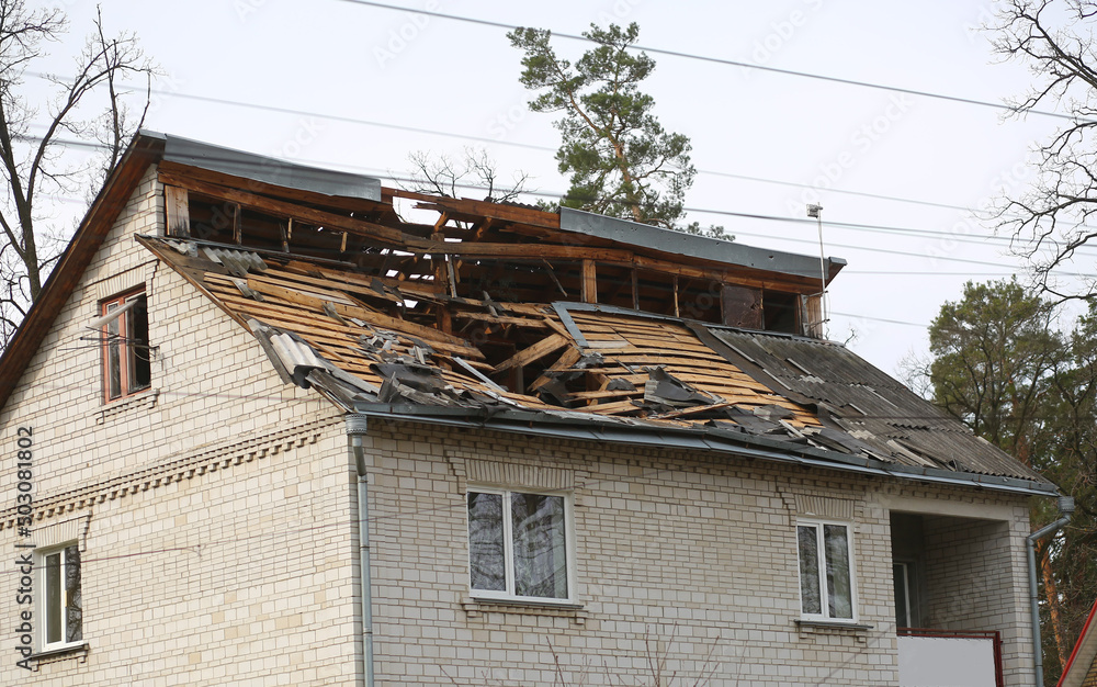 Private house roof destroyed by the military missile Stock Photo ...