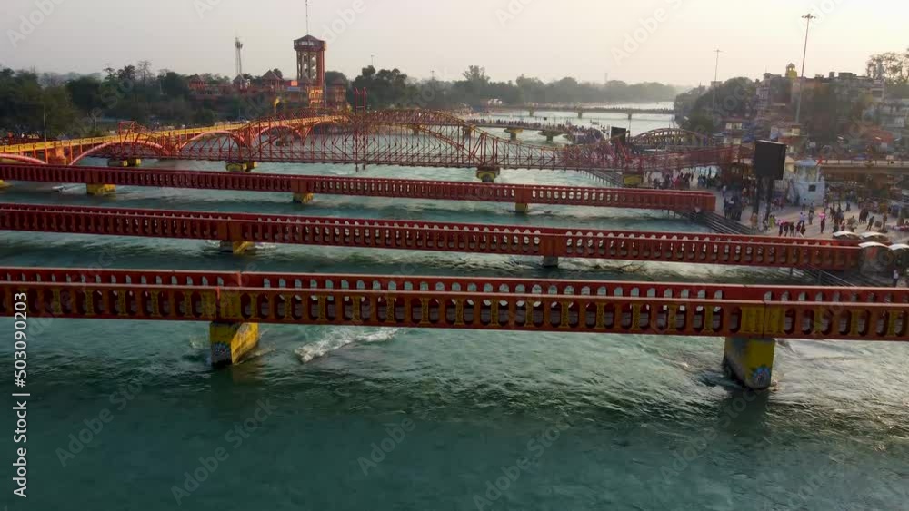 isolated iron bridge many over ganges river with wide view of city at ...