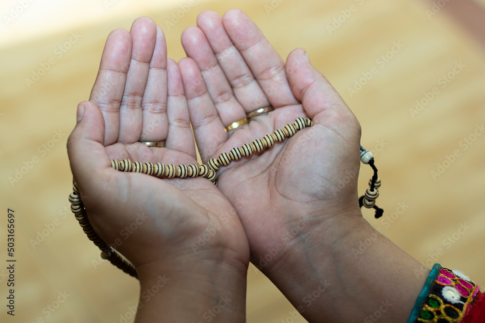 Muslim woman praying,Woman praying hands to Allah with Nafees of Muslim ...