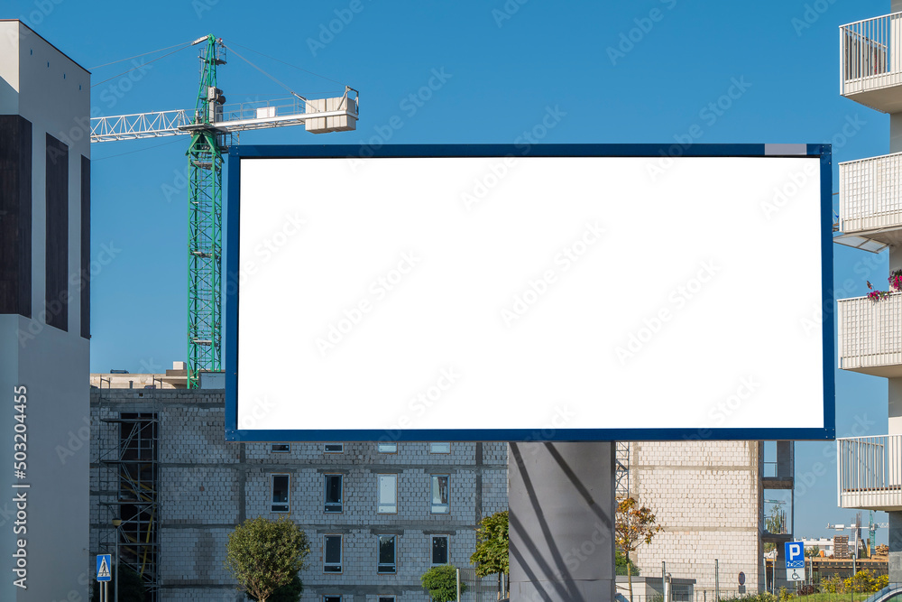 Advertising billboard mock-up in front of the building under ...