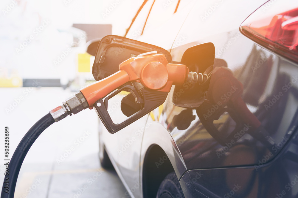Selective focus Refueling the car with diesel at a gas station. Car ...