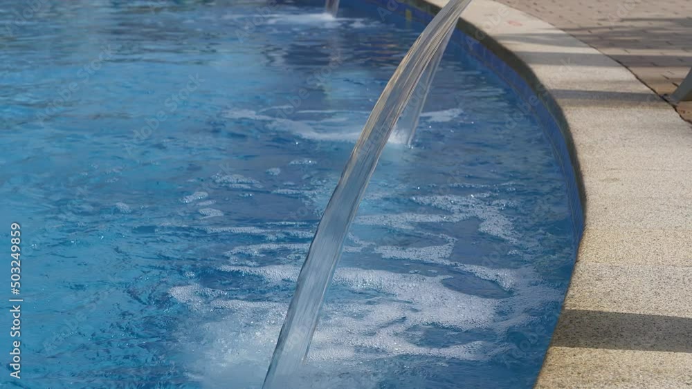 Fresh water jet of a swimming pool. Regenerating jet. Health centre ...