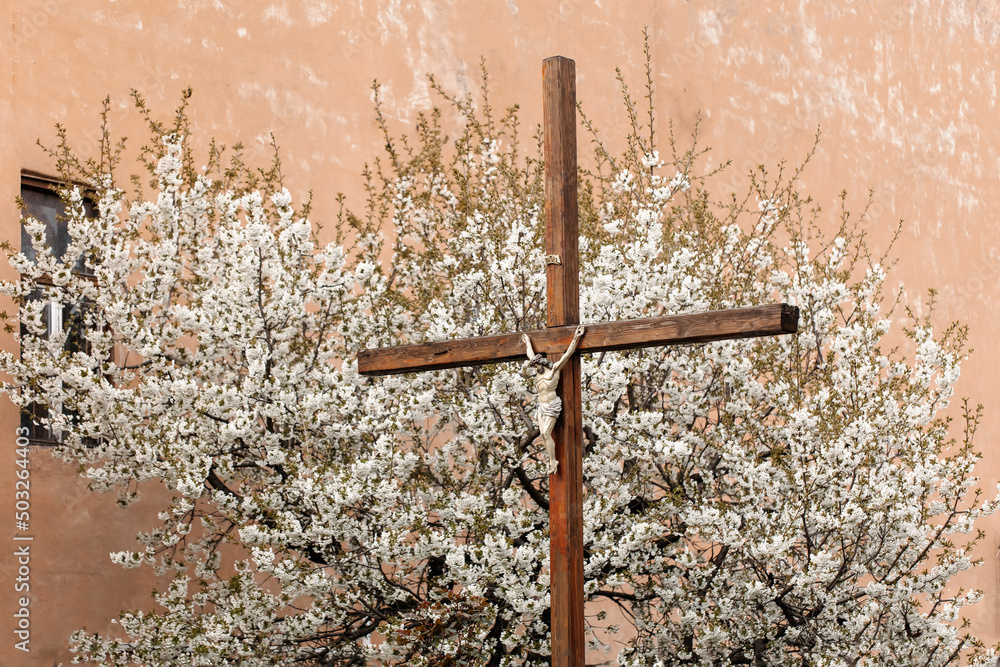 Christian cross on a background of white flowers. Cross symbolizing the ...