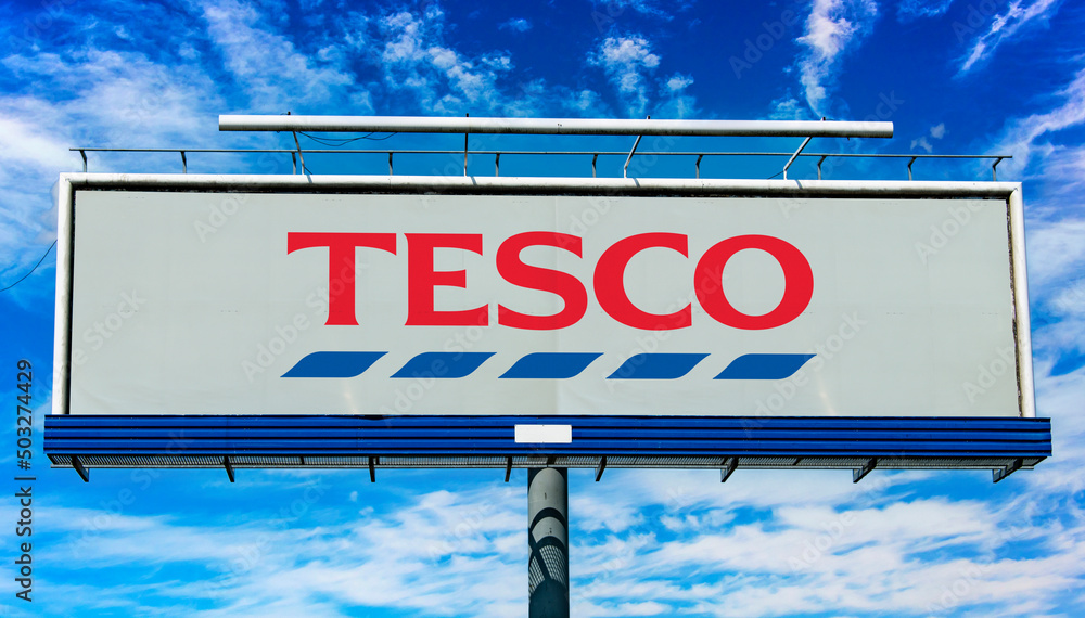 Advertisement billboard displaying logo of Tesco Stock Photo | Adobe Stock Advertisement billboard displaying logo of Tesco Stock Photo | Adobe Stock