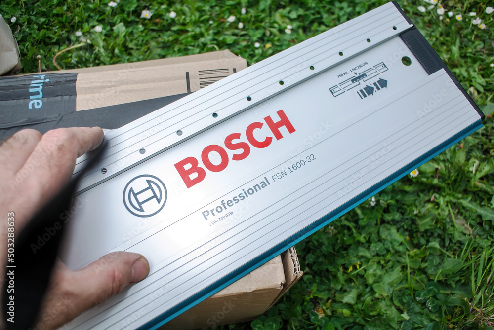 Paris, France - Apr 29, 2022: Worker male hand pointing at the Bosch ...