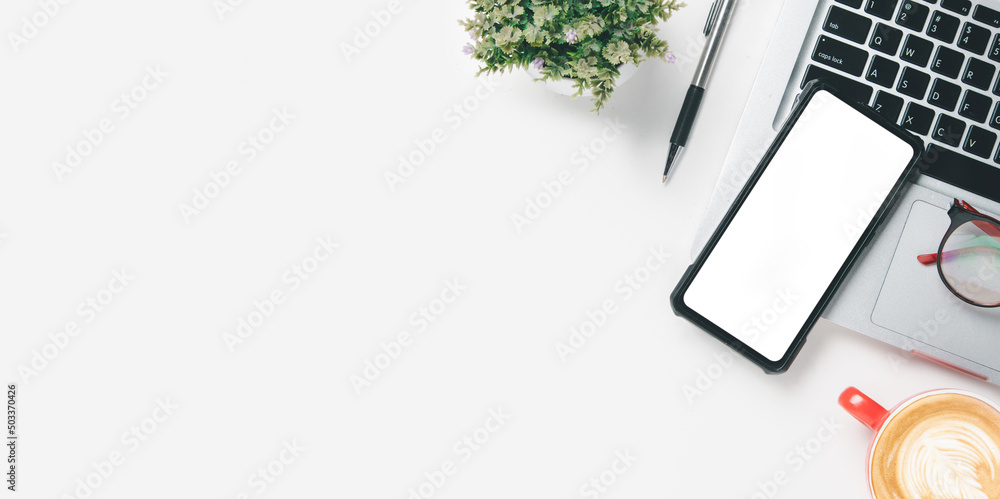 Office desk with laptop computer, Blank screen smart phone, pen ...