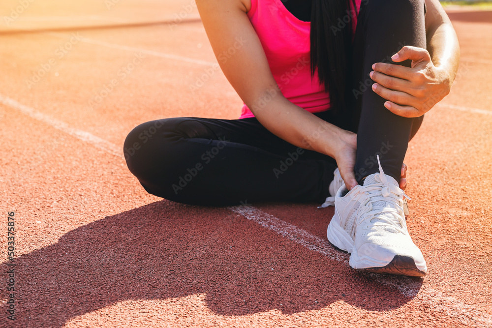 Woman runner has twisted ankle injury while practice marathon run at ...