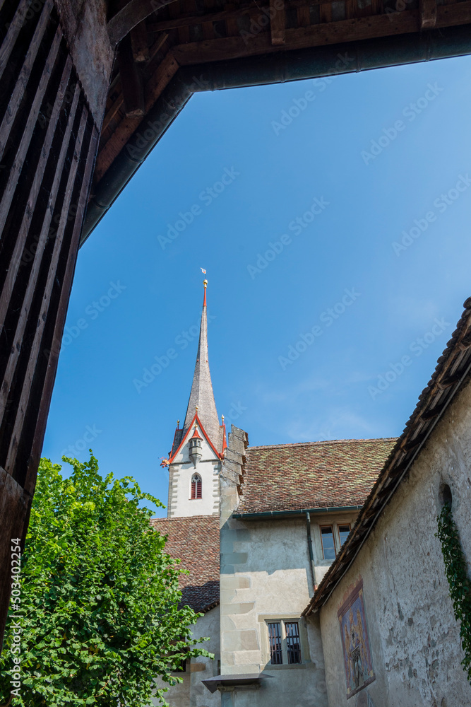 Church tall bell tower St. George's Abbey (Kloster Sankt Georgen) with ...