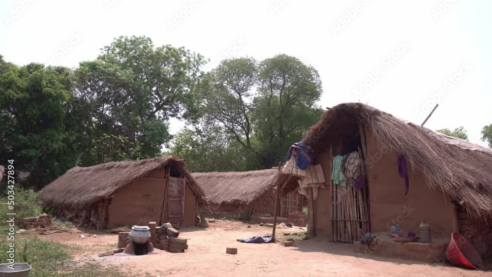 Indigenous people in remote areas of India live in mud huts and ...