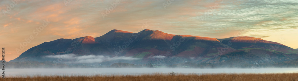 Absolutely stunning vibrant Autumn sunrise landscape image looking from ...