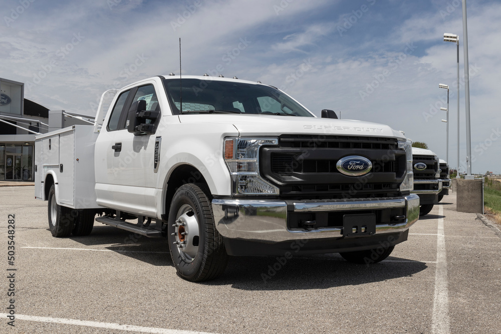 Ford Super Duty F350 truck display at a dealership. The F-350 is ...