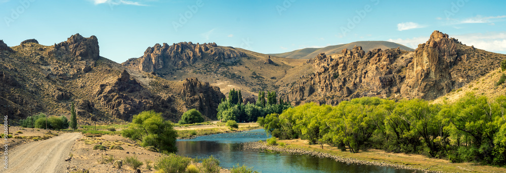 Panoramic of a Mapuche valley of mountains with rock formations making ...