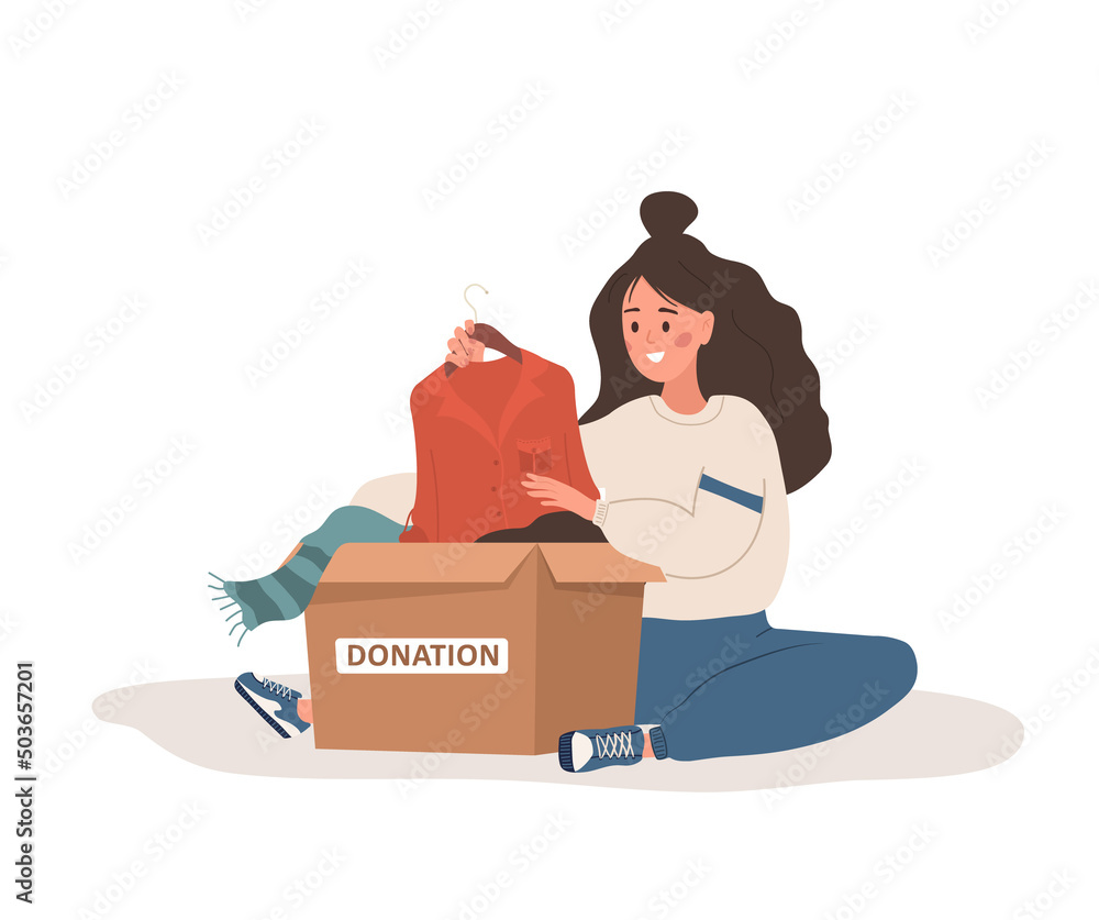 Clothes donation. Woman putting old used clothes ready to be shared or ...
