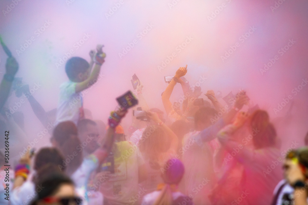 color festival in city crowd celebrating Stock Photo | Adobe Stock