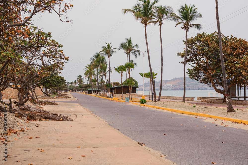 Photos of a beach on a cloudy day from different angles and places, the ...