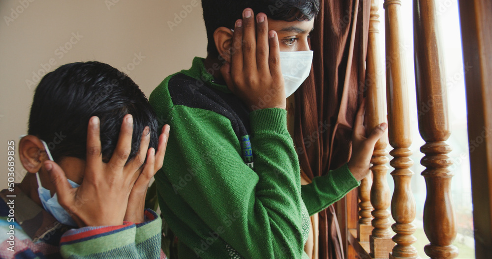 Kids looking out of the window with shocked looks on their faces Stock ...