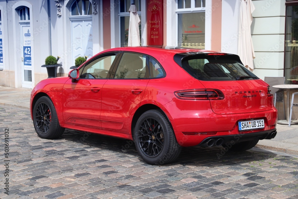 DRESDEN, GERMANY - MAY 10, 2018: Porsche Macan GTS red luxury crossover ...