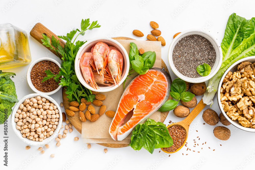 Food sources of omega 3 and omega 6 on white background top view. Foods ...