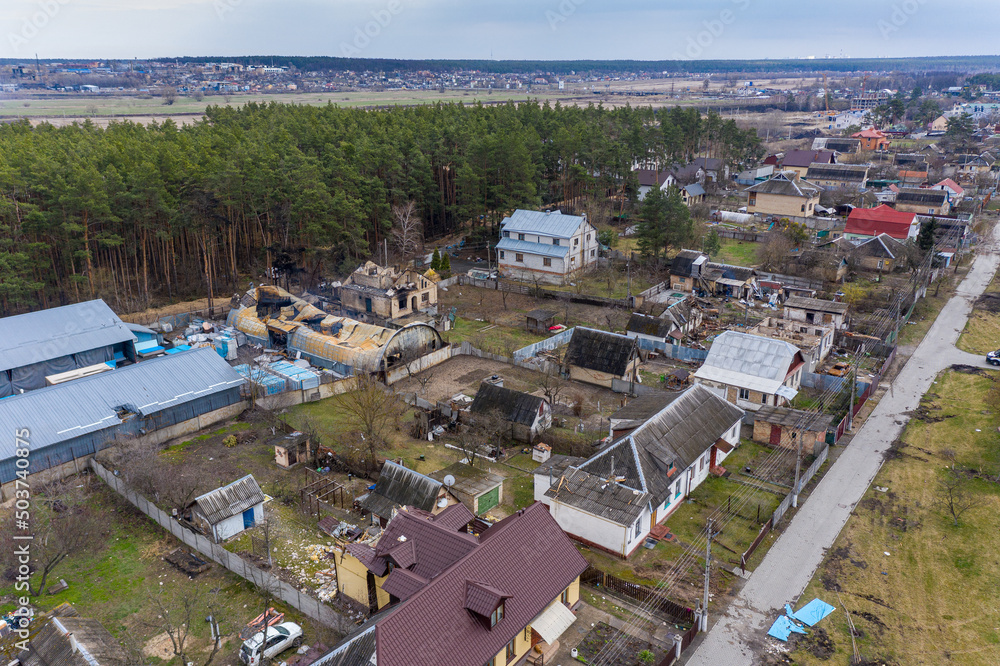 The aerial view of the destroyed and burnt buildings. The buildings ...