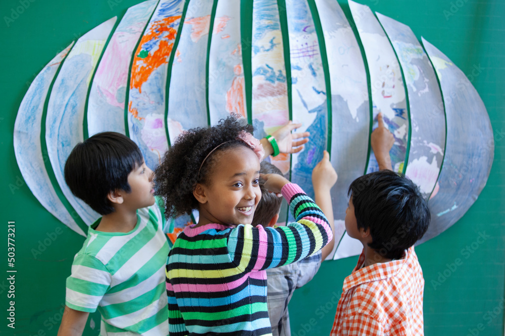 Students with world map Stock Photo | Adobe Stock