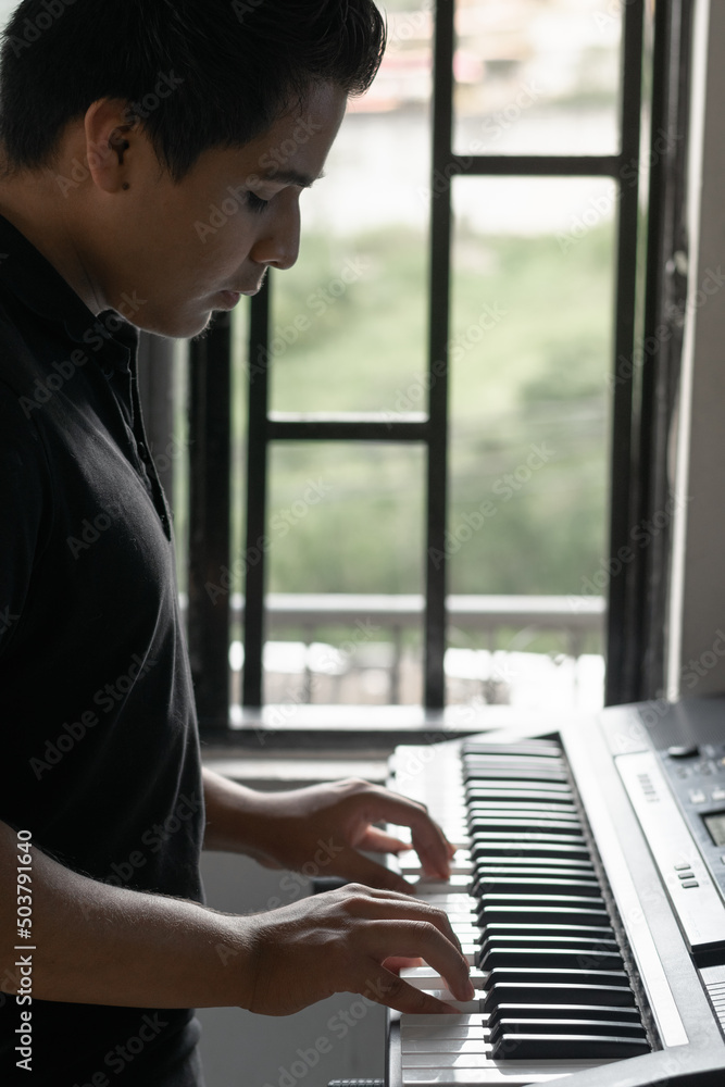 Person Playing Keyboard Synth
