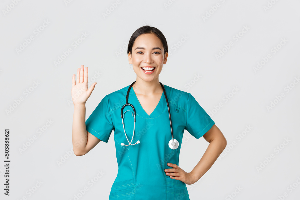 Covid-19, healthcare workers and preventing virus concept. Friendly ...