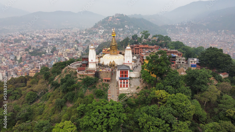 Bird's eye view of the Swayambhu religious complex in bright sunlight ...