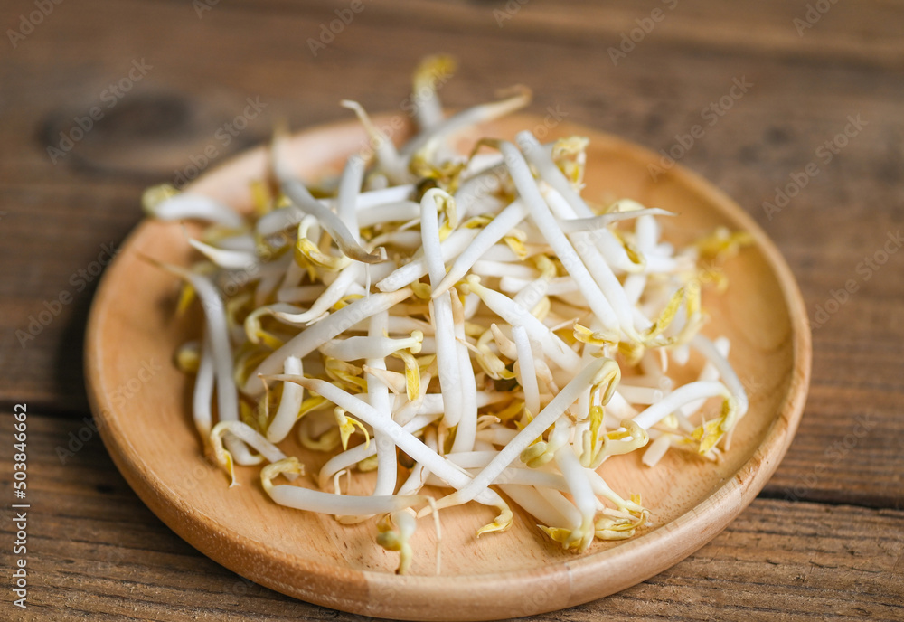 Bean sprouts on wooden plate table background in the kitchen, Raw white ...