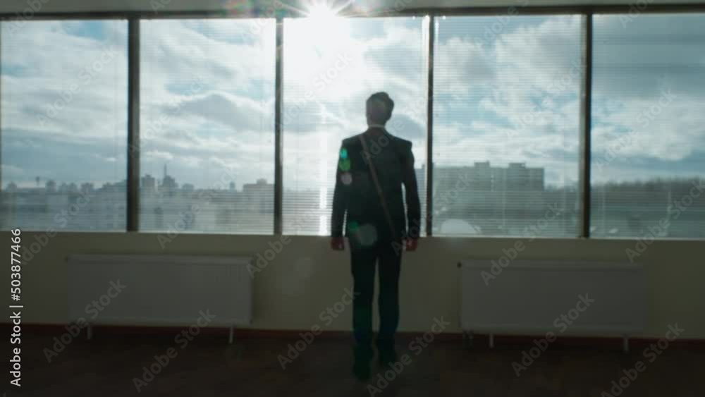 Blurred view, business motivation, businessman stands in front of a ...