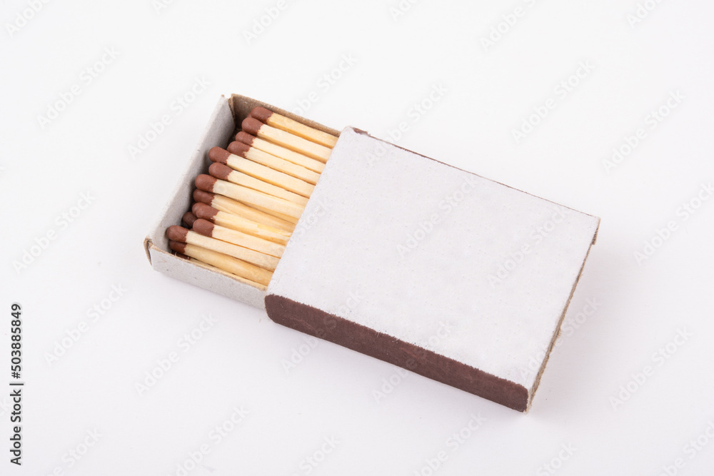Opened old box of matches isolated on white background. Space for ...