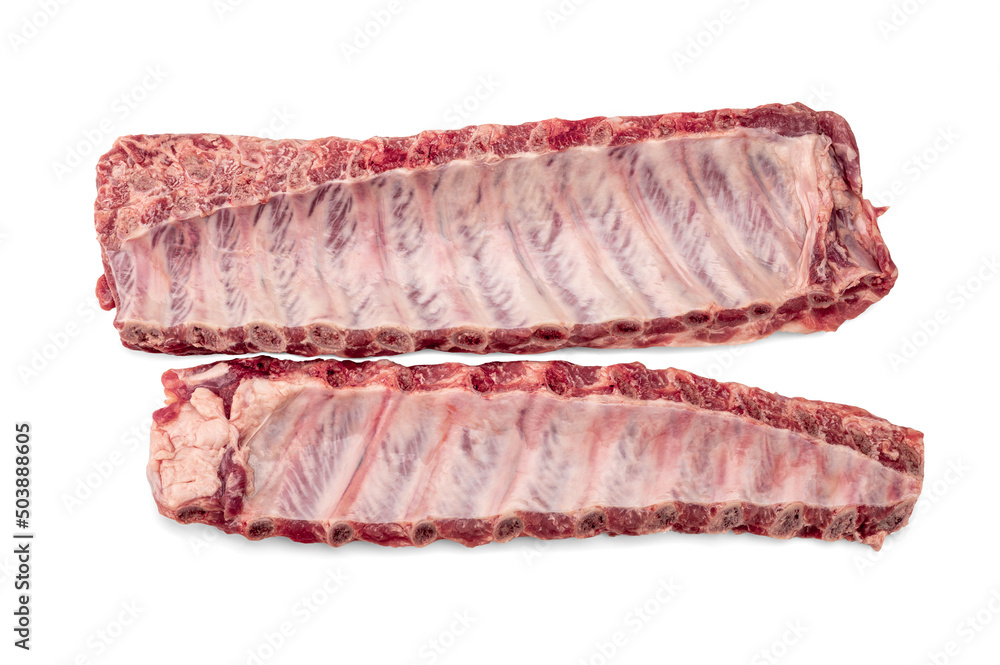 British raw pork ribs on wooden chopping board, raw meat on white ...