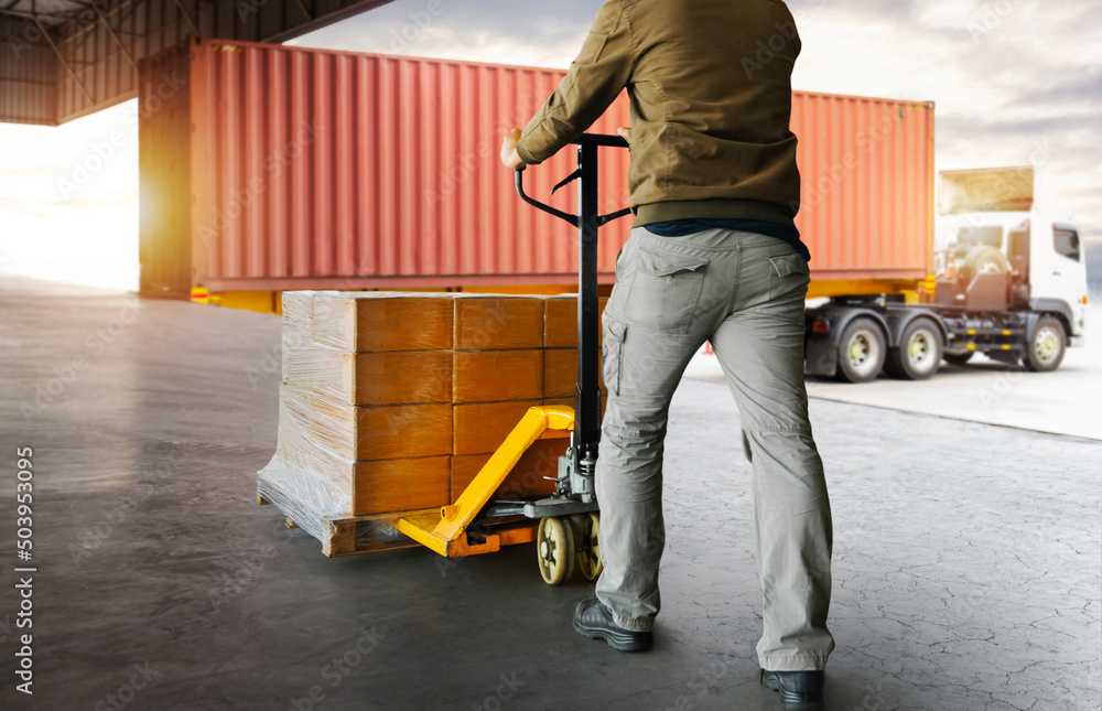 Workers Unloading Packaging Boxes on Pallets to The Cargo Container ...
