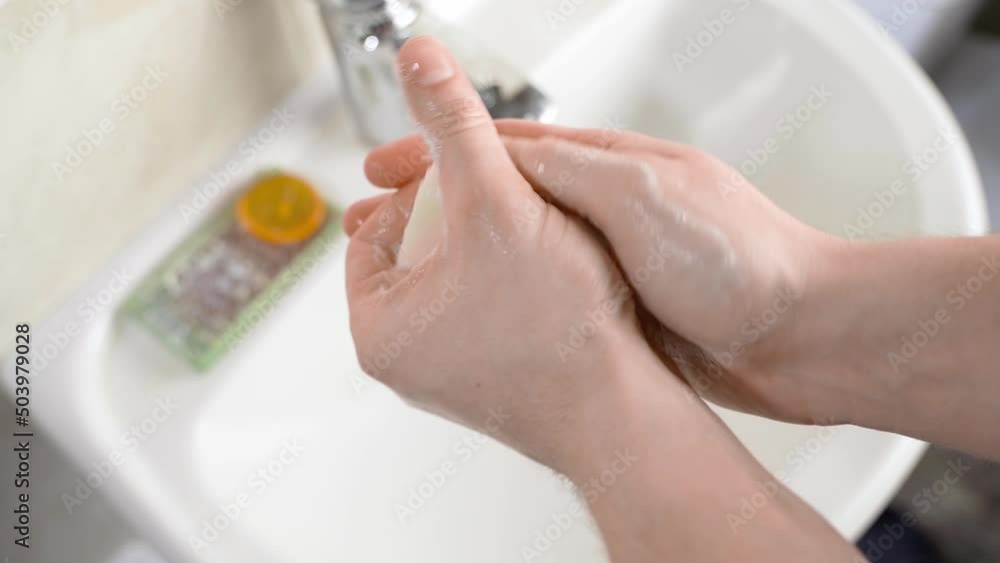 Vidéo Stock Lathering hands with white soap and thoroughly washing ...