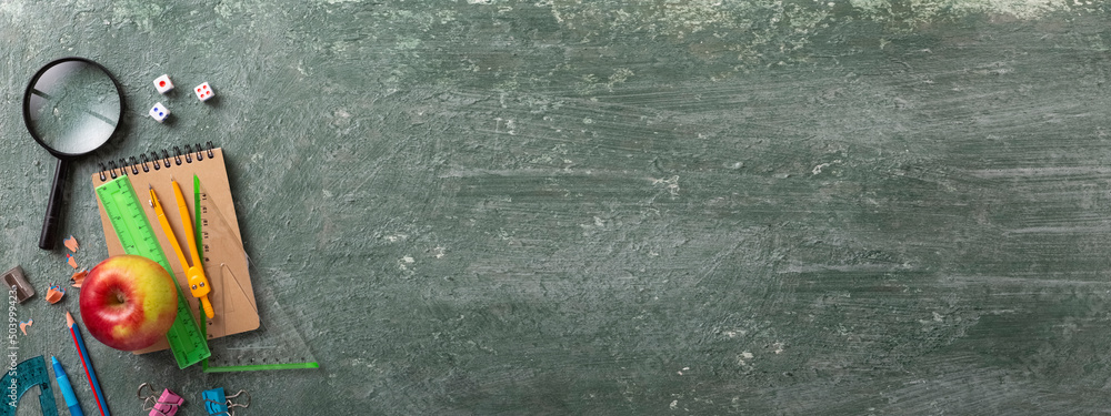 School background with school supplies and copy space. Top view, pens ...