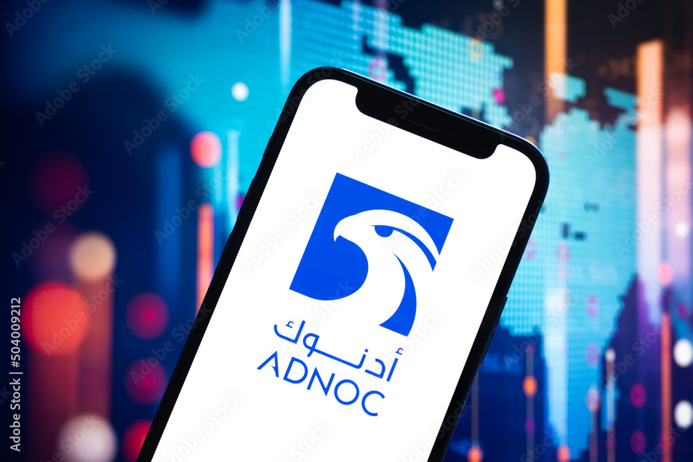 Index of ADNOC oil prices, logo close-up. Petroleum stock market graphs ...