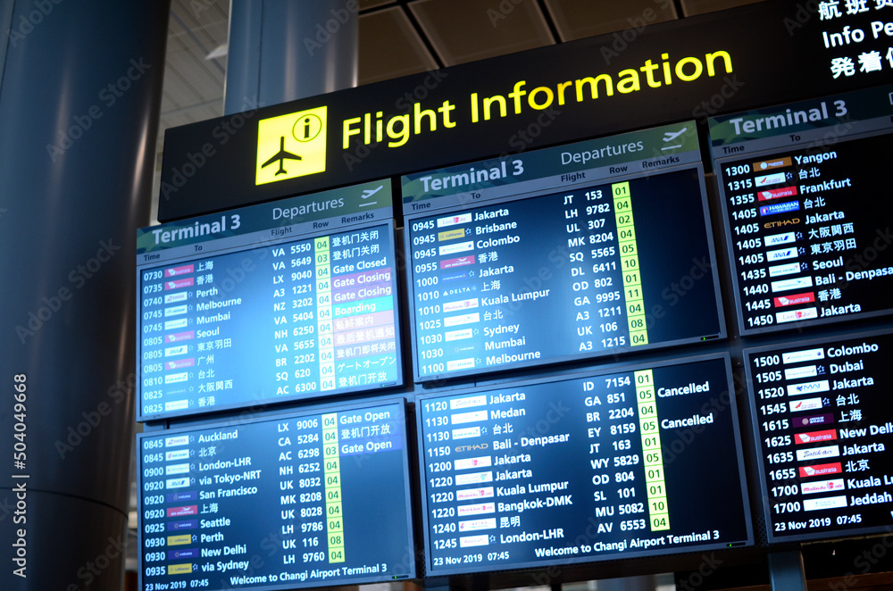 Flight info panel at Changi Airport Singapore Stock Photo | Adobe Stock