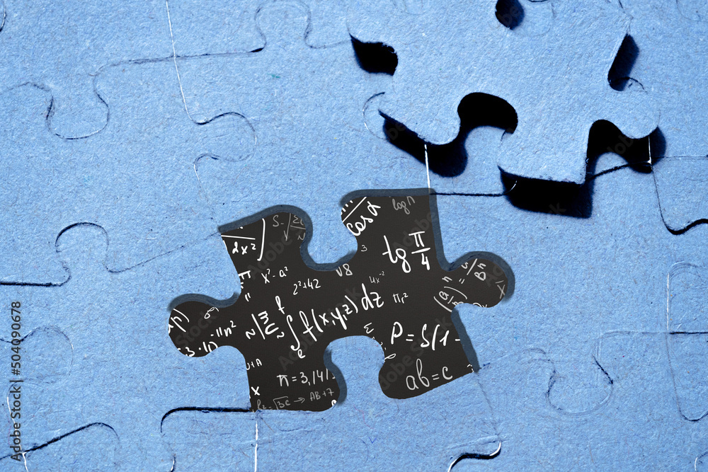 puzzle and mathematical formulas, education concept, scientific ...