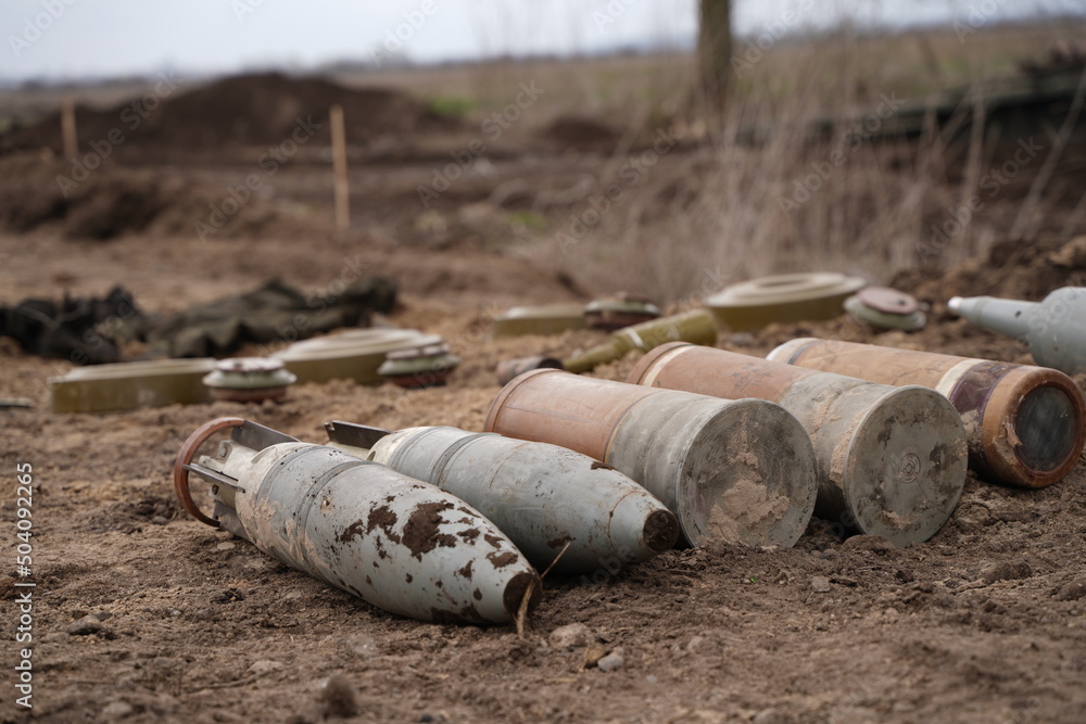 Demining by troops of the territory. Many mines, shells, artillery ...