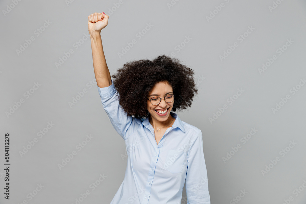 Young excited fun employee business corporate lawyer woman of African American ethnicity in ...