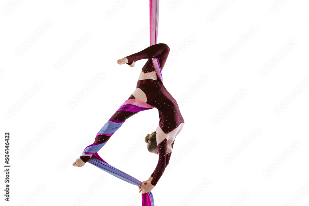 Young flexible girl, air rhythmic gymnast training, flying with special ...