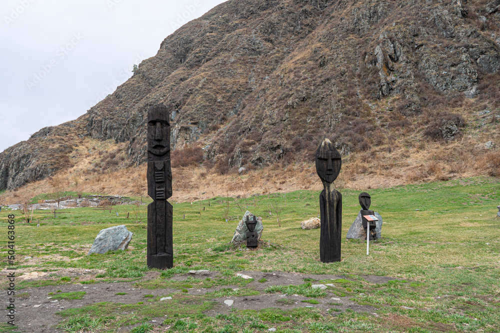 Ancient wooden statues for worship during paganism. symbol of the ...