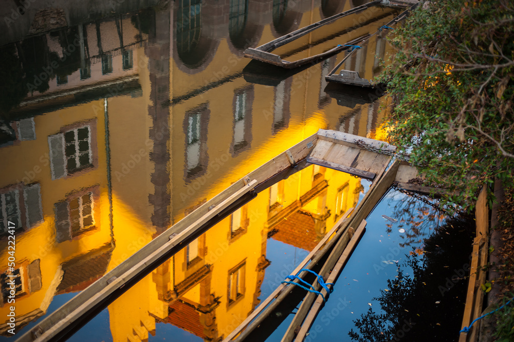reflection of a medieval street on a drowned boats Stock Photo | Adobe ...