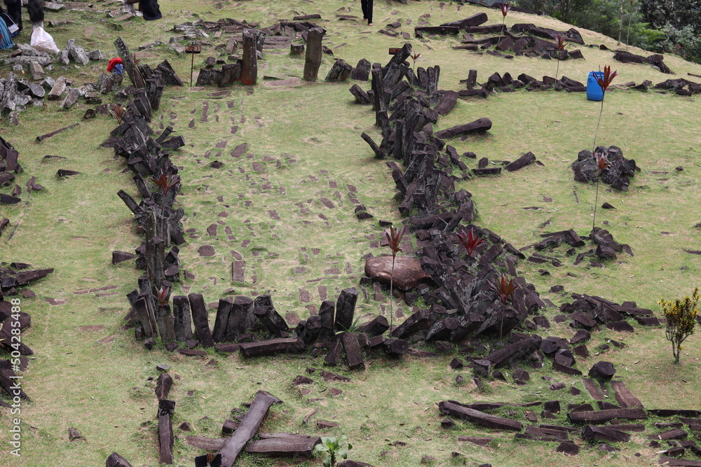 elongated rock formations piled together to form a pyramid at the ...