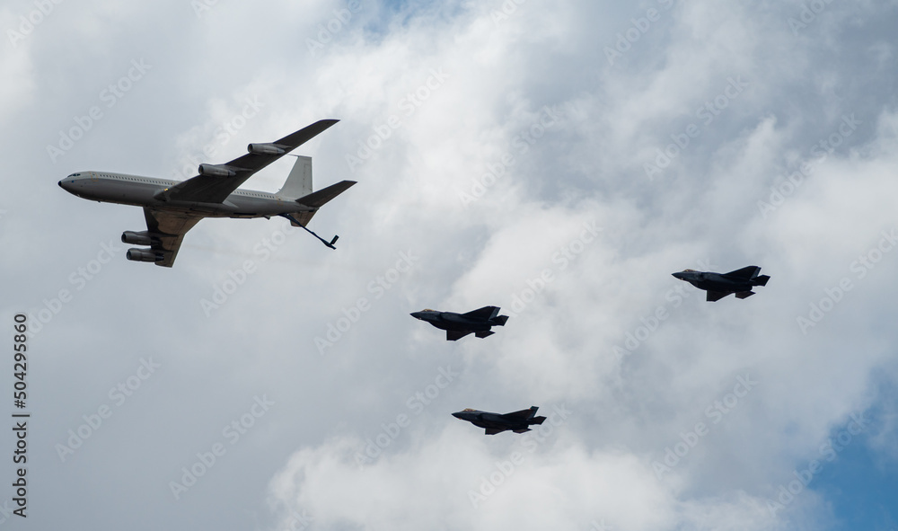 Three Israeli Stealth Fighter Jets Flying in Formation together with a ...