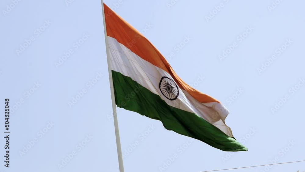 India flag flying high with pride in blue sky, India flag fluttering ...