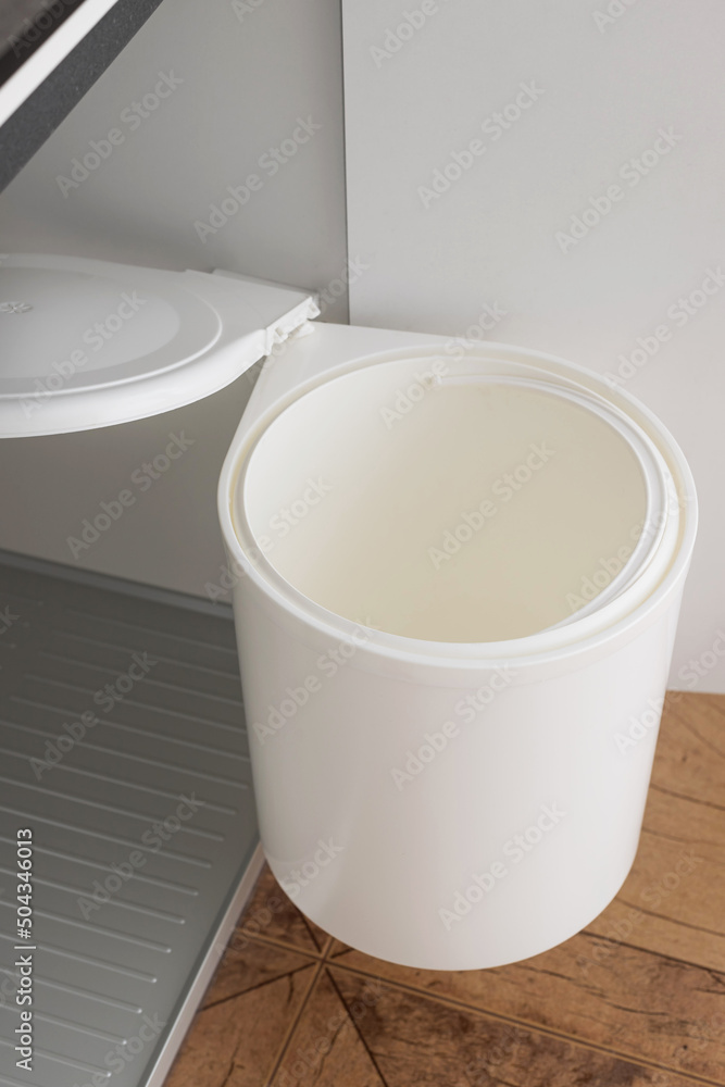 installed garbage bin with lid under sink hanging on cupboard kitchen ...