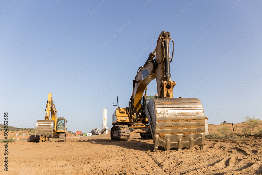 Excavator shovel and road construction equipment Stock Photo | Adobe Stock