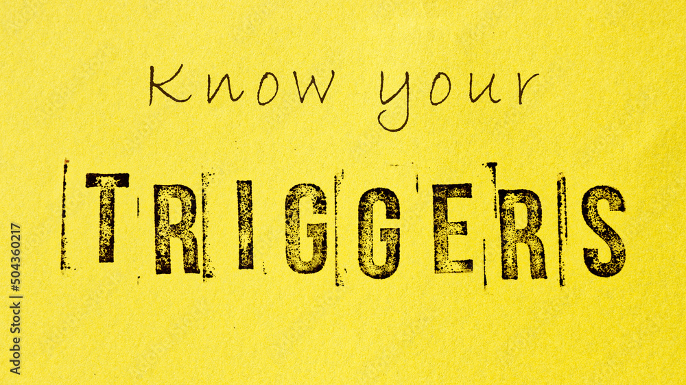 Know your triggers sign message on yellow background. Mental triggering ...