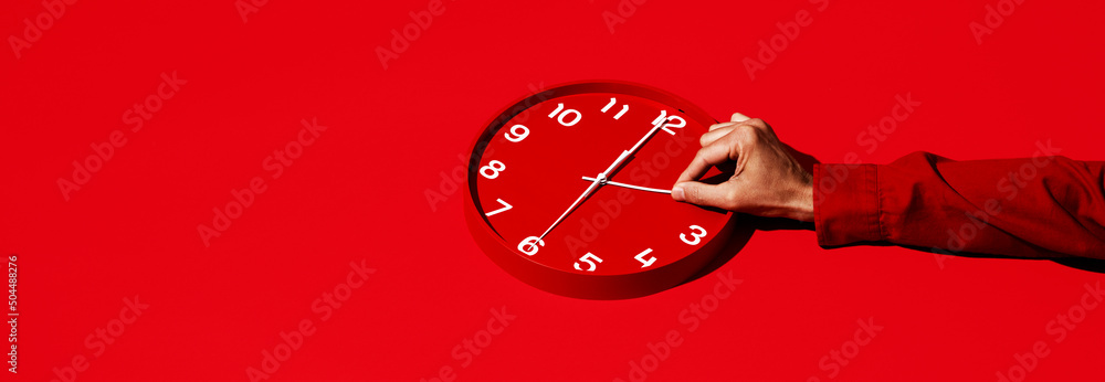 resetting a red clock, in a banner format Stock Photo | Adobe Stock
