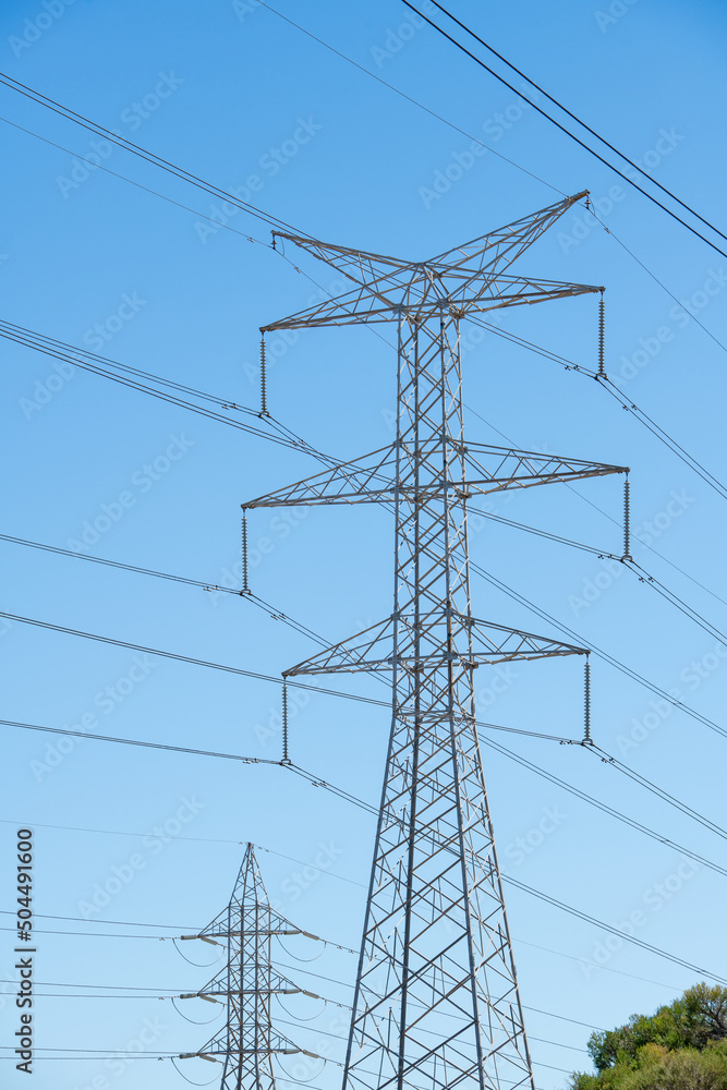 Array of high voltage power lines Stock Photo | Adobe Stock